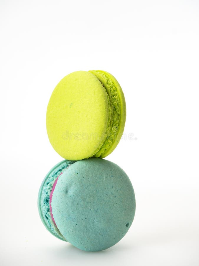 Two macarons love on white stock image. Image of green - 140574723