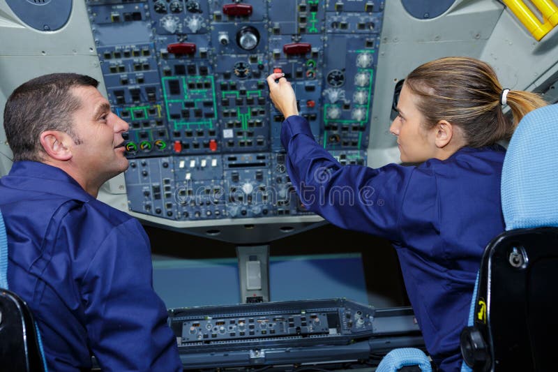 Two Maintenance Engineers Inside Airplane Stock Photo - Image of ...