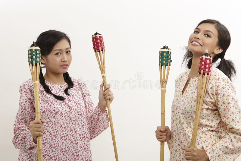 Malay women with pelita stock photo. Image of pelita - 105789624 Malay women with pelita stock photo. Image of pelita - 105789624