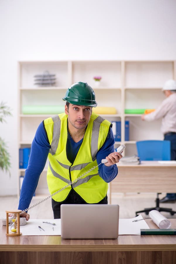 Two Male Architects Working on the Project Stock Photo - Image of ...