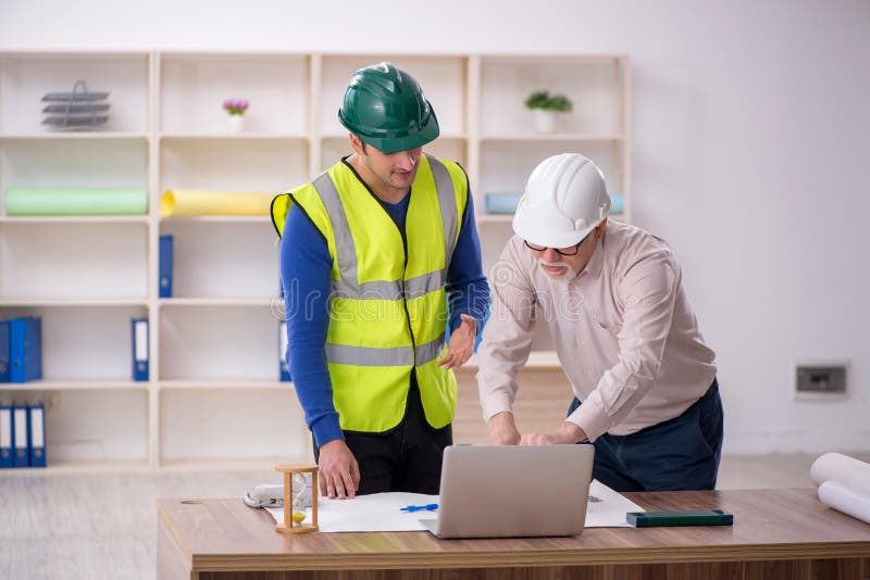Two Male Architects Working on the Project Stock Photo - Image of ...