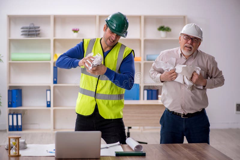 Two Male Architects Working on the Project Stock Photo - Image of ...