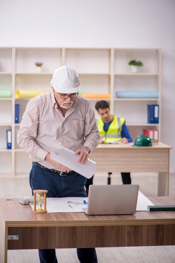 Two Male Architects Working on the Project Stock Image - Image of ...