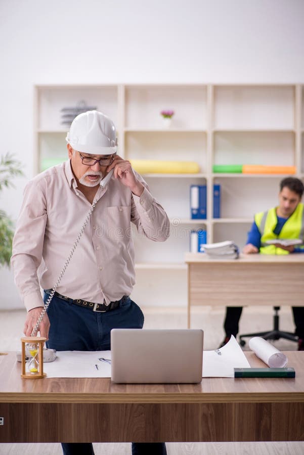 Two Male Architects Working on the Project Stock Image - Image of ...