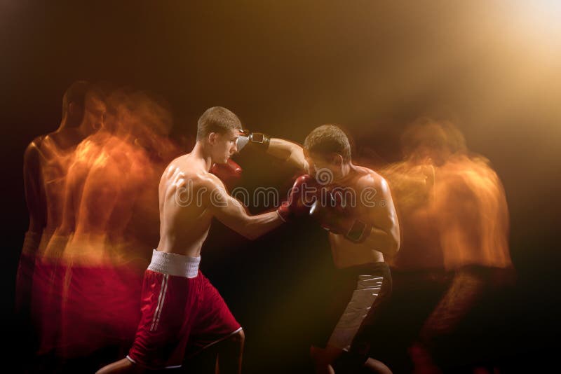 The Two Male Boxers Boxing in a Dark Studio Stock Image - Image of ...
