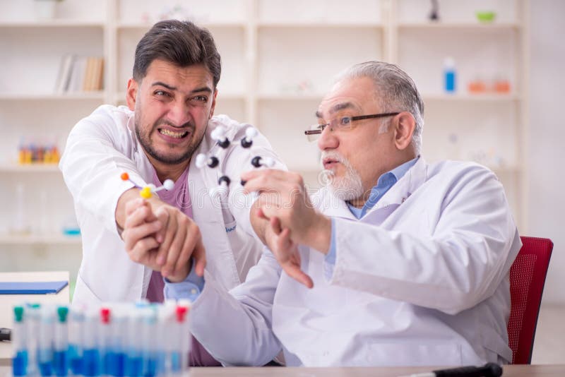 Two Male Chemists Working at the Lab Stock Photo - Image of physicist ...