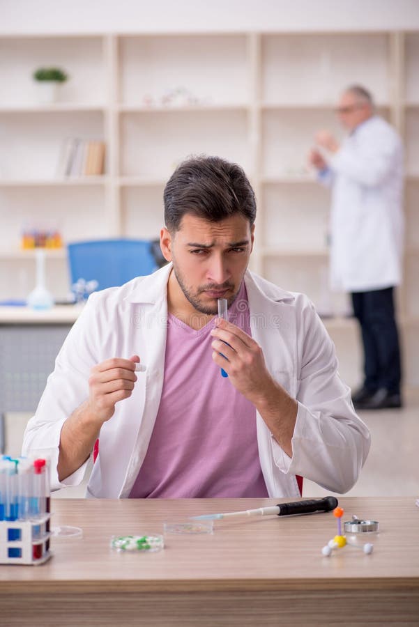 Two Male Chemists Working at the Lab Stock Image - Image of chemists ...