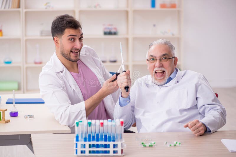 Two Male Chemists Working at the Lab Stock Photo - Image of science ...