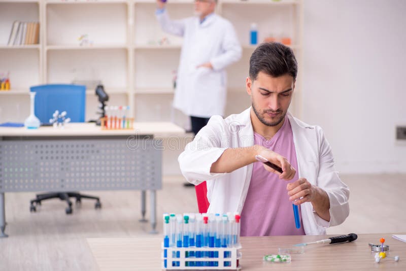 Two Male Chemists Working at the Lab Stock Photo - Image of colleagues ...