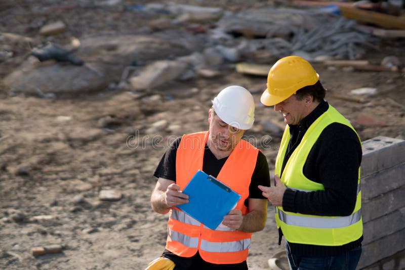 Civil Engineers at Work on Construction Site Stock Photo - Image of ...