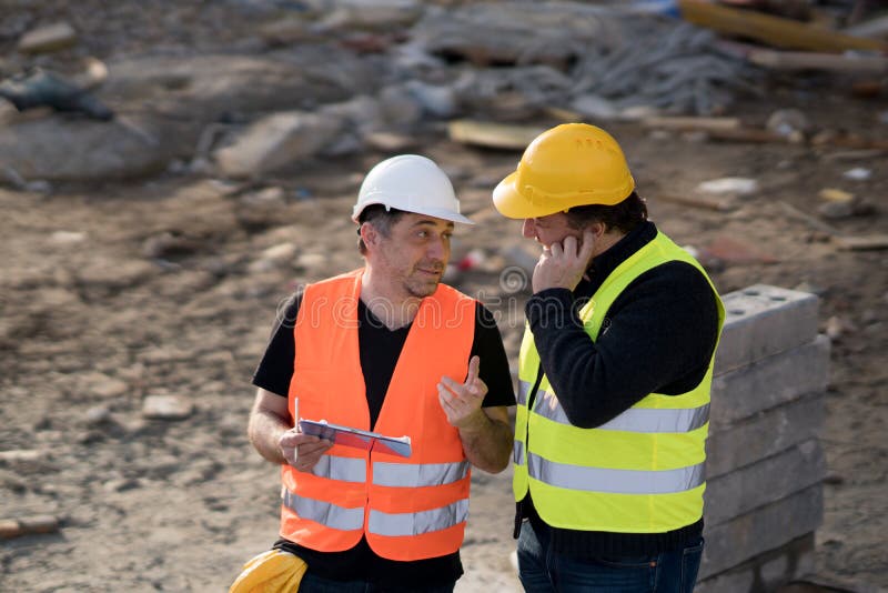 Civil Engineers at Work on Construction Site Stock Photo - Image of ...
