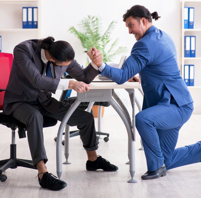 Two Male Colleagues in the Office Stock Photo - Image of competitive ... Two Male Colleagues in the Office Stock Photo - Image of competitive ...