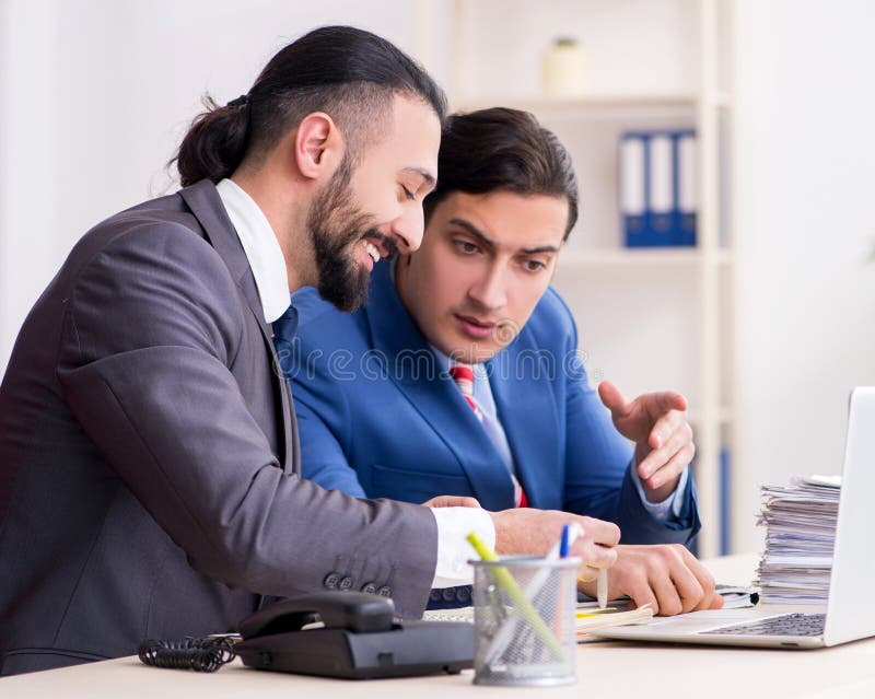 Two Male Colleagues in the Office Stock Photo - Image of explaining ...