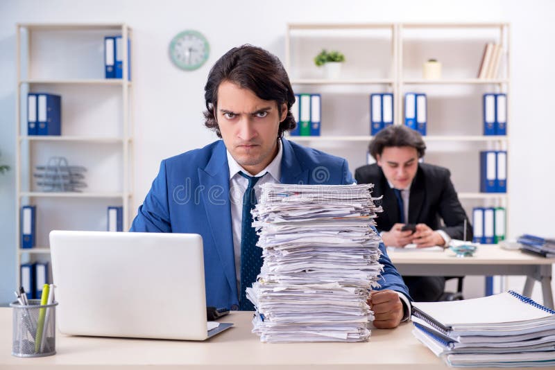 Two Male Colleagues Unhappy with Excessive Work Stock Image - Image of ...