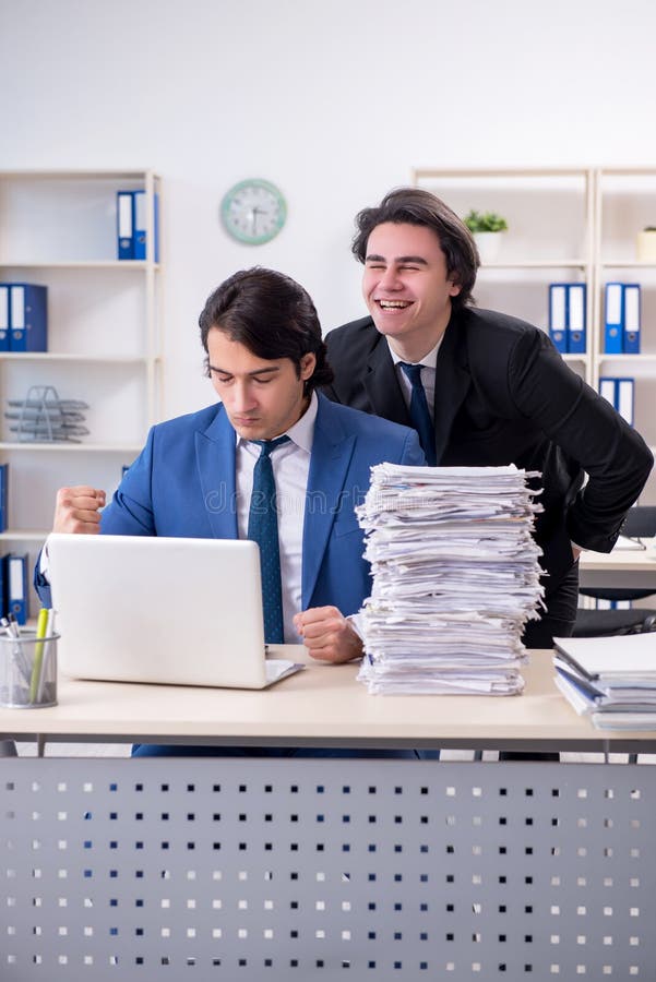 Two Male Colleagues Unhappy with Excessive Work Stock Photo - Image of ...