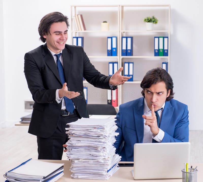 Two Male Colleagues Unhappy with Excessive Work Stock Photo - Image of ...