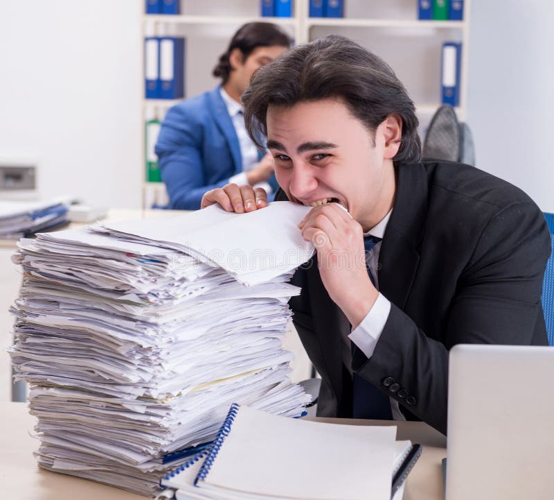 Two Male Colleagues Unhappy with Excessive Work Stock Photo - Image of ...