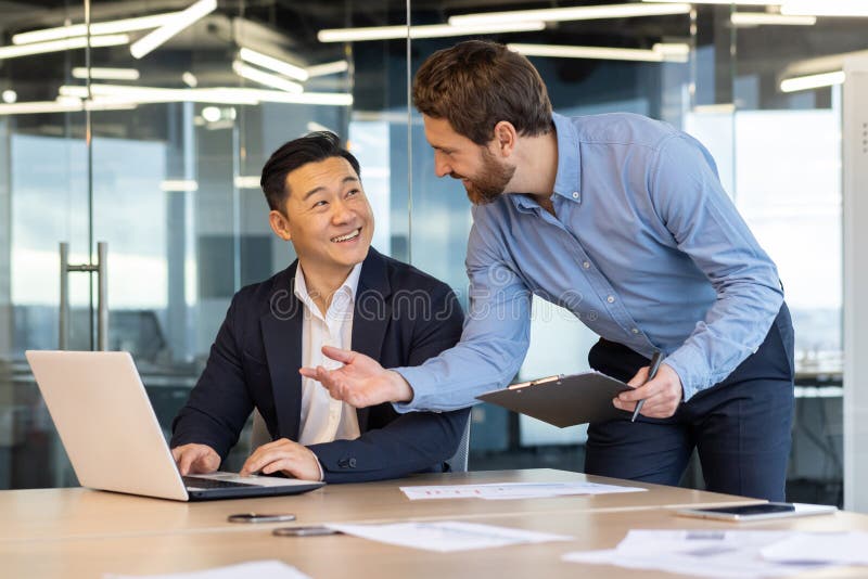 Two Male Colleagues Work in the Office, Consult on Issues, Solve Work ...