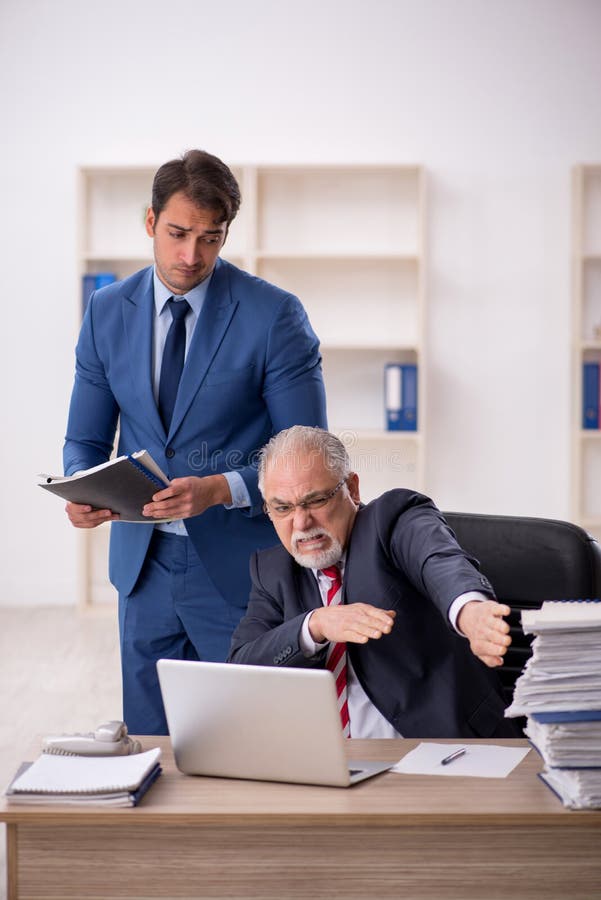 Two Male Colleagues Working in the Office Stock Photo - Image of ...