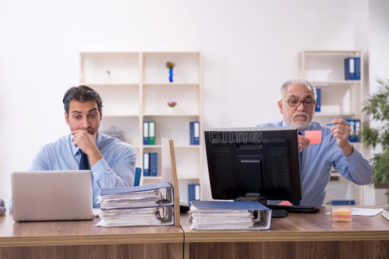 Two Male Colleagues Working in the Office Stock Photo - Image of ...