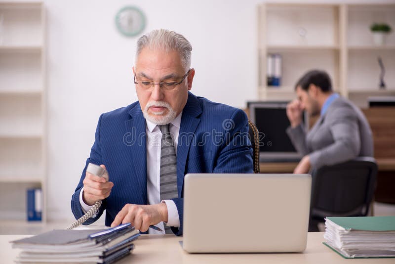 Two Male Colleagues Working in the Office Stock Photo - Image of ...