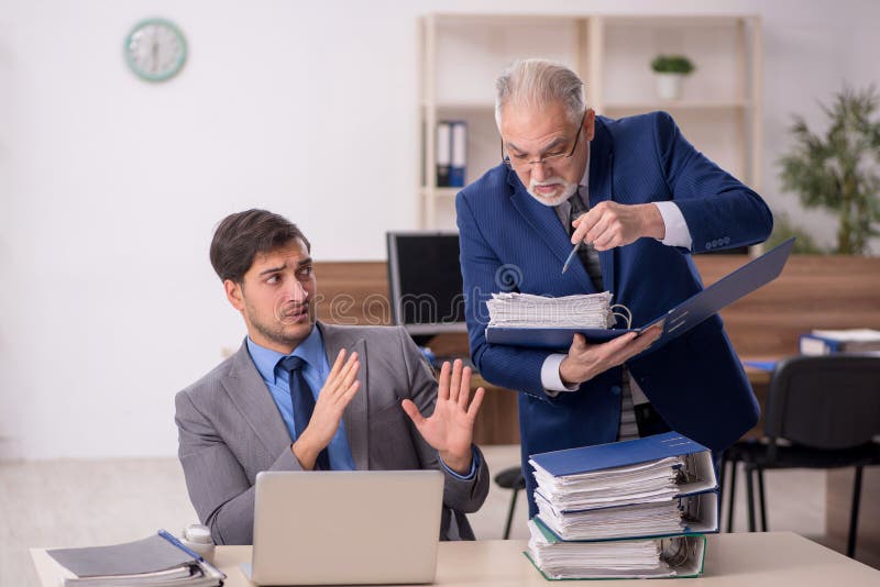 Two Male Colleagues Working in the Office Stock Photo - Image of ...