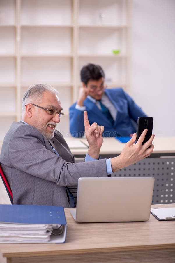 Two Male Colleagues Working in the Office Stock Photo - Image of ...