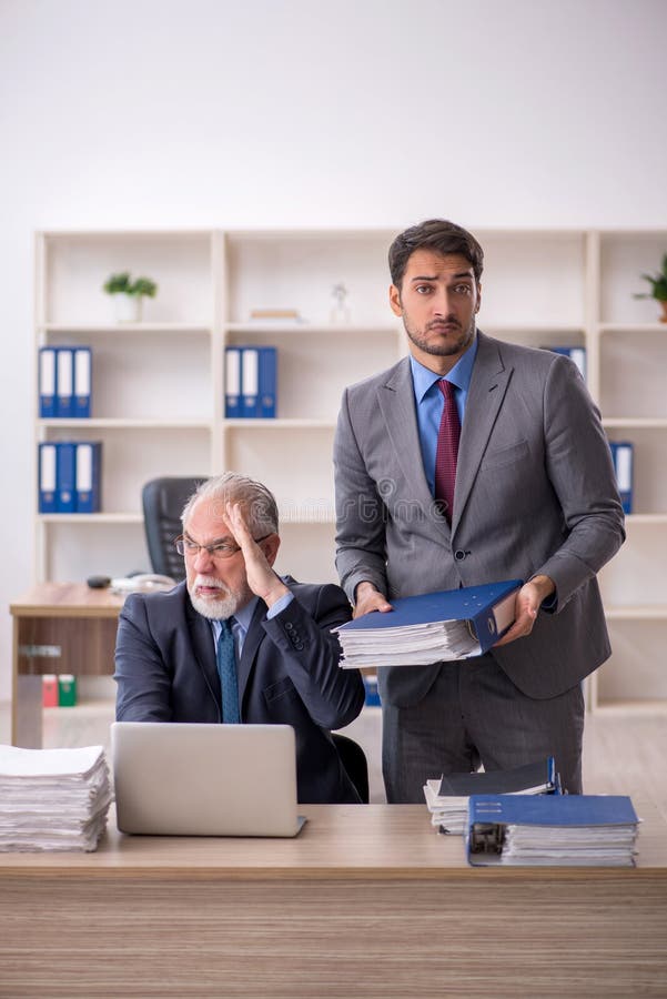 Two Male Colleagues Working in the Office Stock Photo - Image of ...