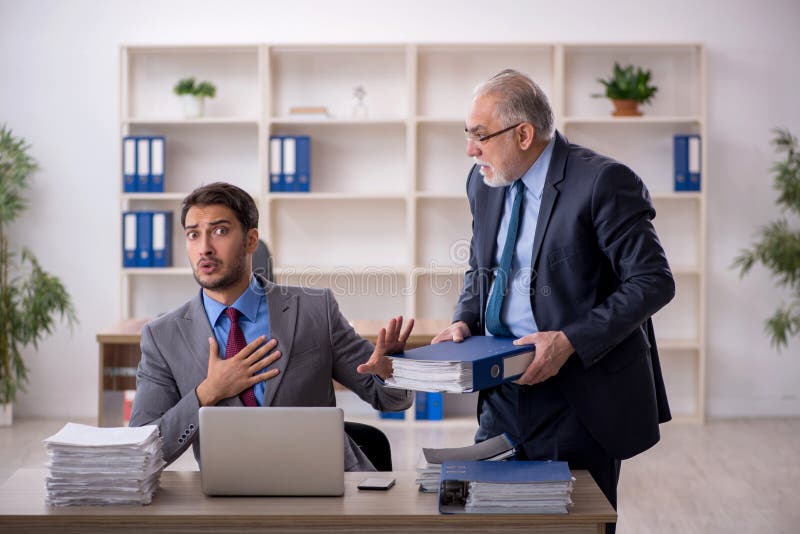 Two Male Colleagues Working in the Office Stock Photo - Image of ...
