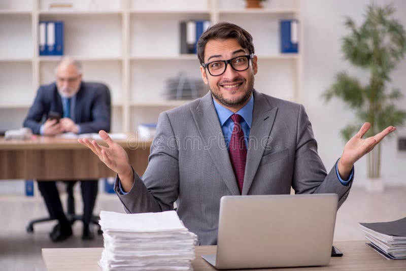Two Male Colleagues Working in the Office Stock Photo - Image of ...