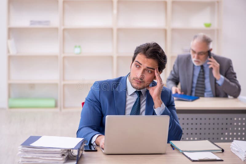 Two Male Colleagues Working in the Office Stock Photo - Image of ...