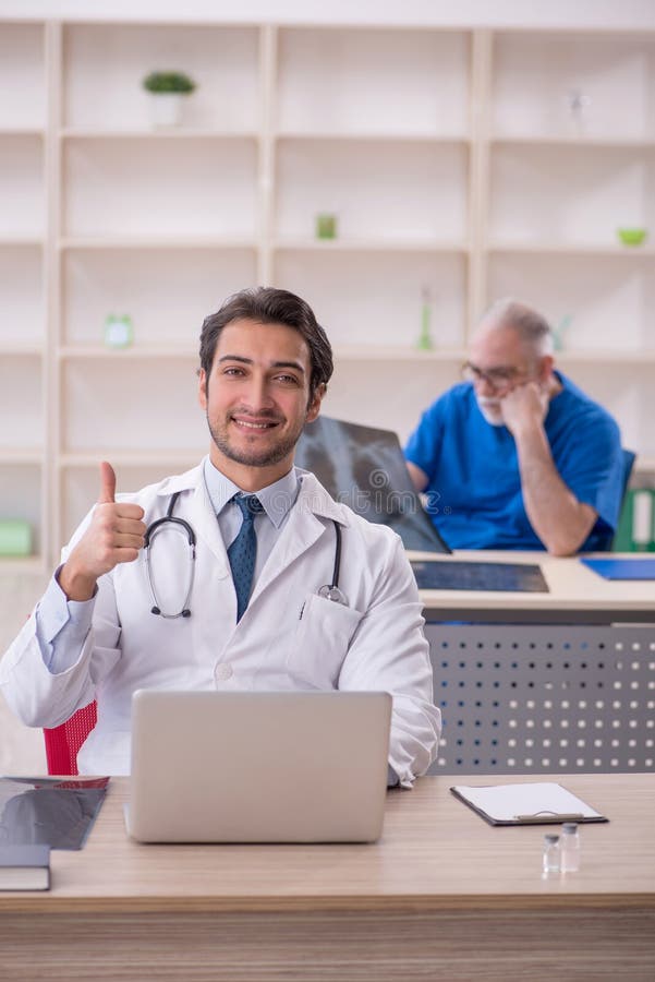 Two Male Doctors in Telemedicine Concept Stock Photo - Image of ...