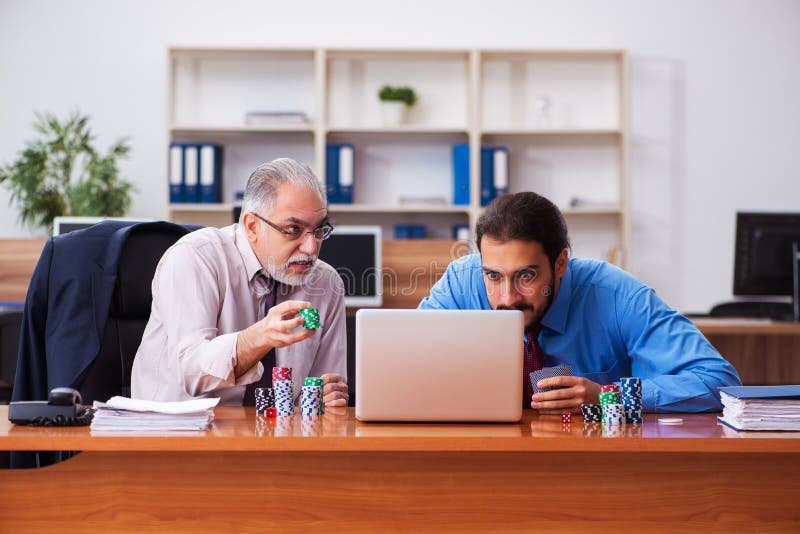 Two Male Employees Playing Cards at Workplace Stock Image - Image of ...