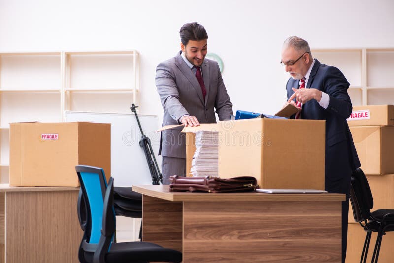Two Male Employees in Relocation Concept Stock Image - Image of ...