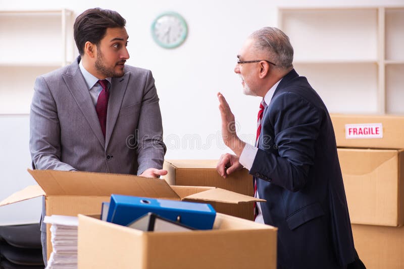 Two Male Employees in Relocation Concept Stock Photo - Image of work ...