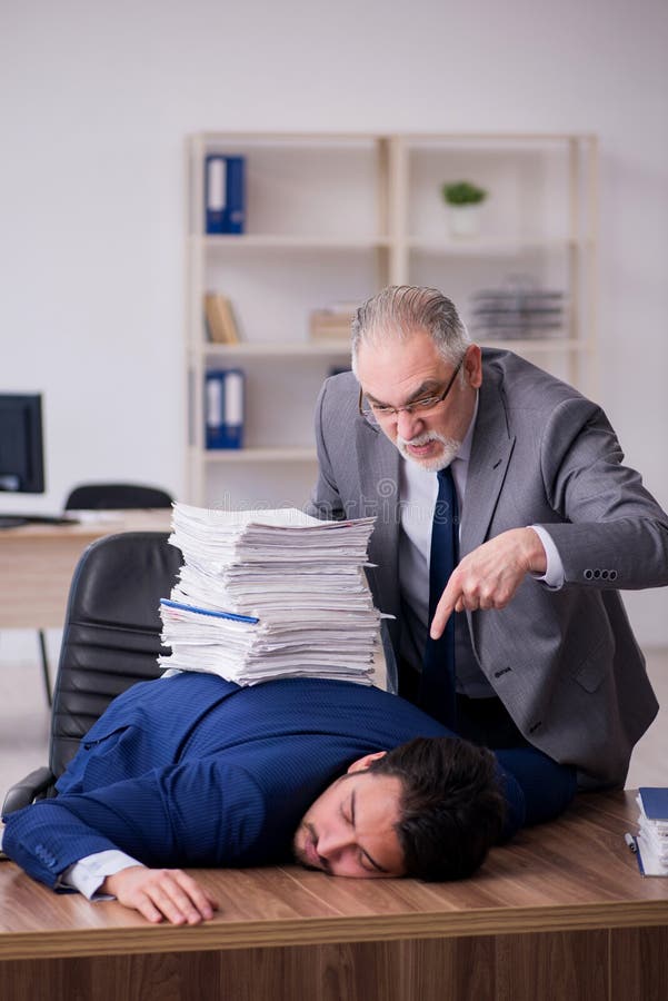 Two Male Employees and Too Much Work in the Office Stock Image - Image ...