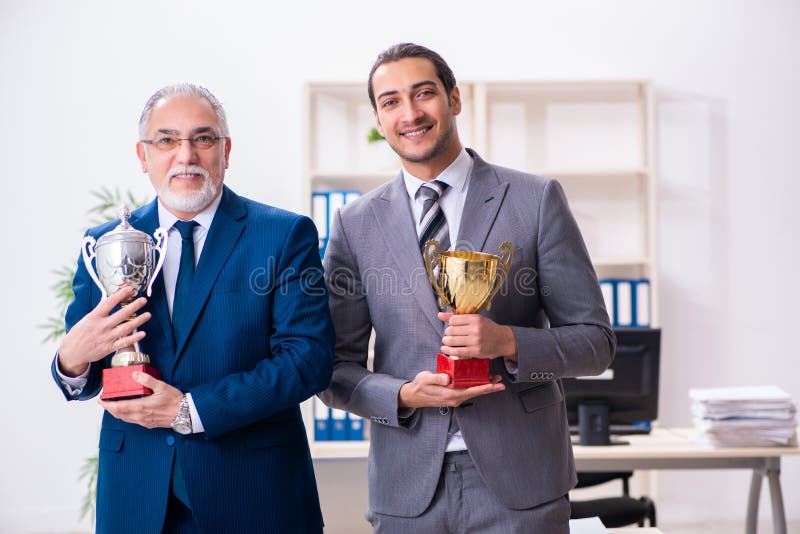 Two Male Employees Working in the Office Stock Image - Image of ...
