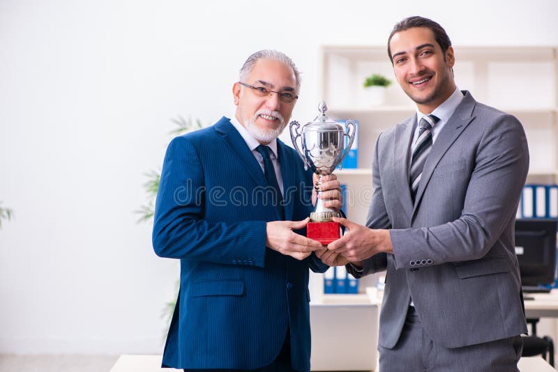 Two Male Employees Working in the Office Stock Image - Image of ...