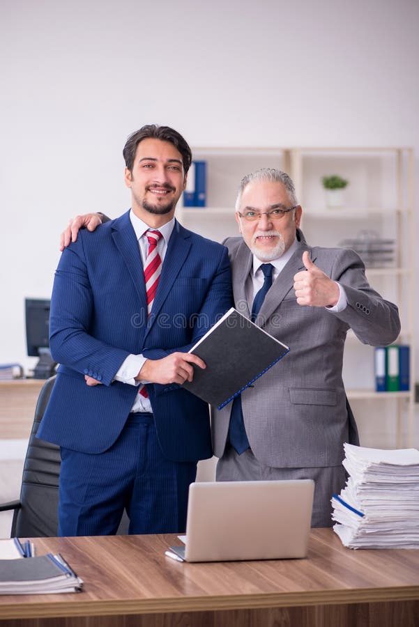 Two Male Employees Working in the Office Stock Image - Image of happy ...