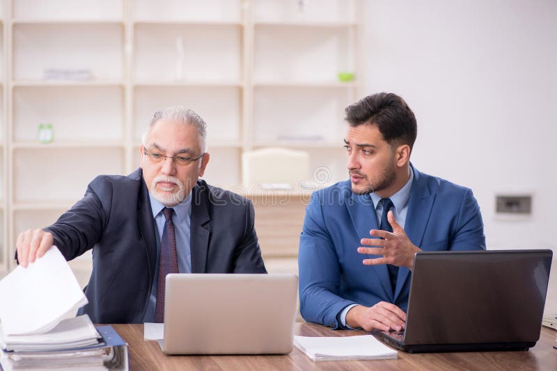 Two Male Employees Working in the Office Stock Photo - Image of auditor ...