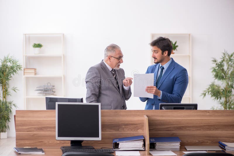 Two Male Employees Working in the Office Stock Photo - Image of busy ...