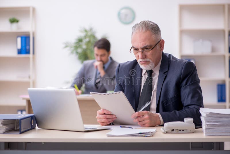 Two Male Employees Working in the Office Stock Photo - Image of working ...