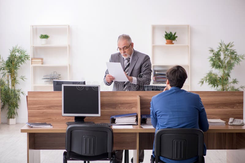 Two Male Employees Working in the Office Stock Image - Image of ...