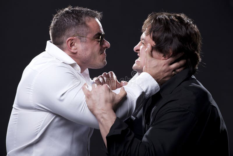 Two Male Friends in Aggressive Expression Close Up Stock Photo - Image ...