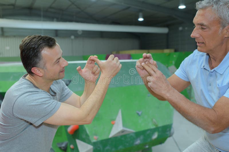 Two Male Friends Talking in Sign Language Stock Photo - Image of finger ...