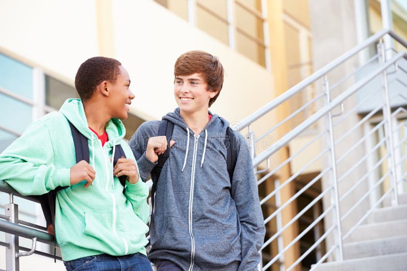 Two Male High School Students Standing Outside Building Stock Photo ...