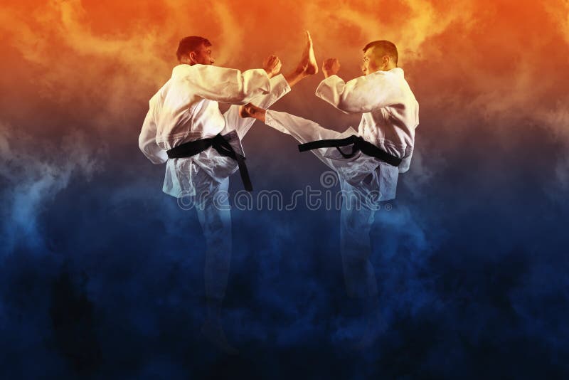 Two male karate fighting stock photo. Image of action - 139836358
