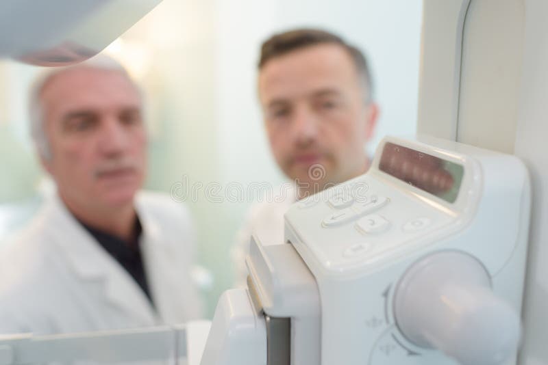 Two Male Medics Stood by Medical Apparatus Stock Photo - Image of work ...