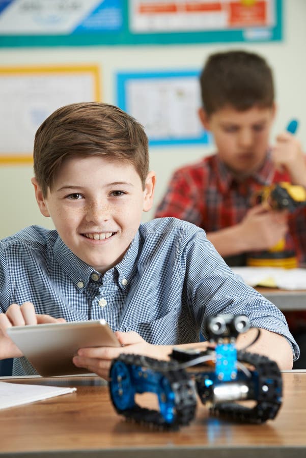 Two Male Pupils in Science Lesson Studying Robotics Stock Photo - Image ...
