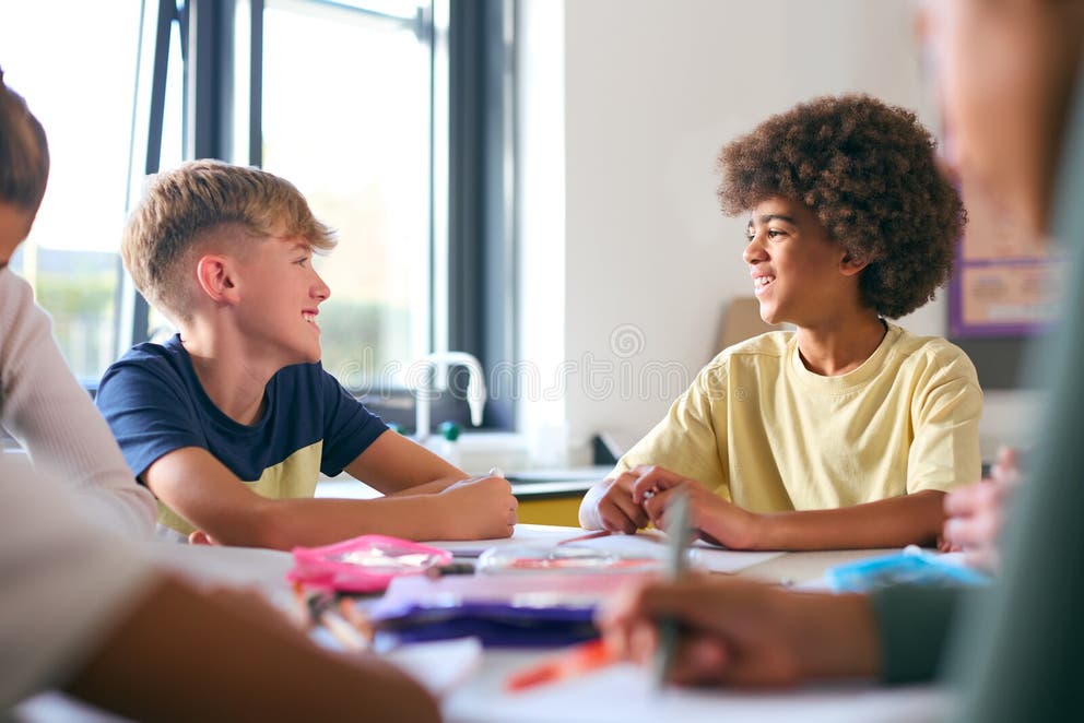Two Male Secondary or High School Students Sitting at Table in Science ...